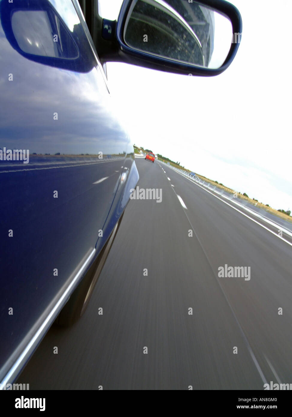 View from the window of a speeding car Stock Photo - Alamy