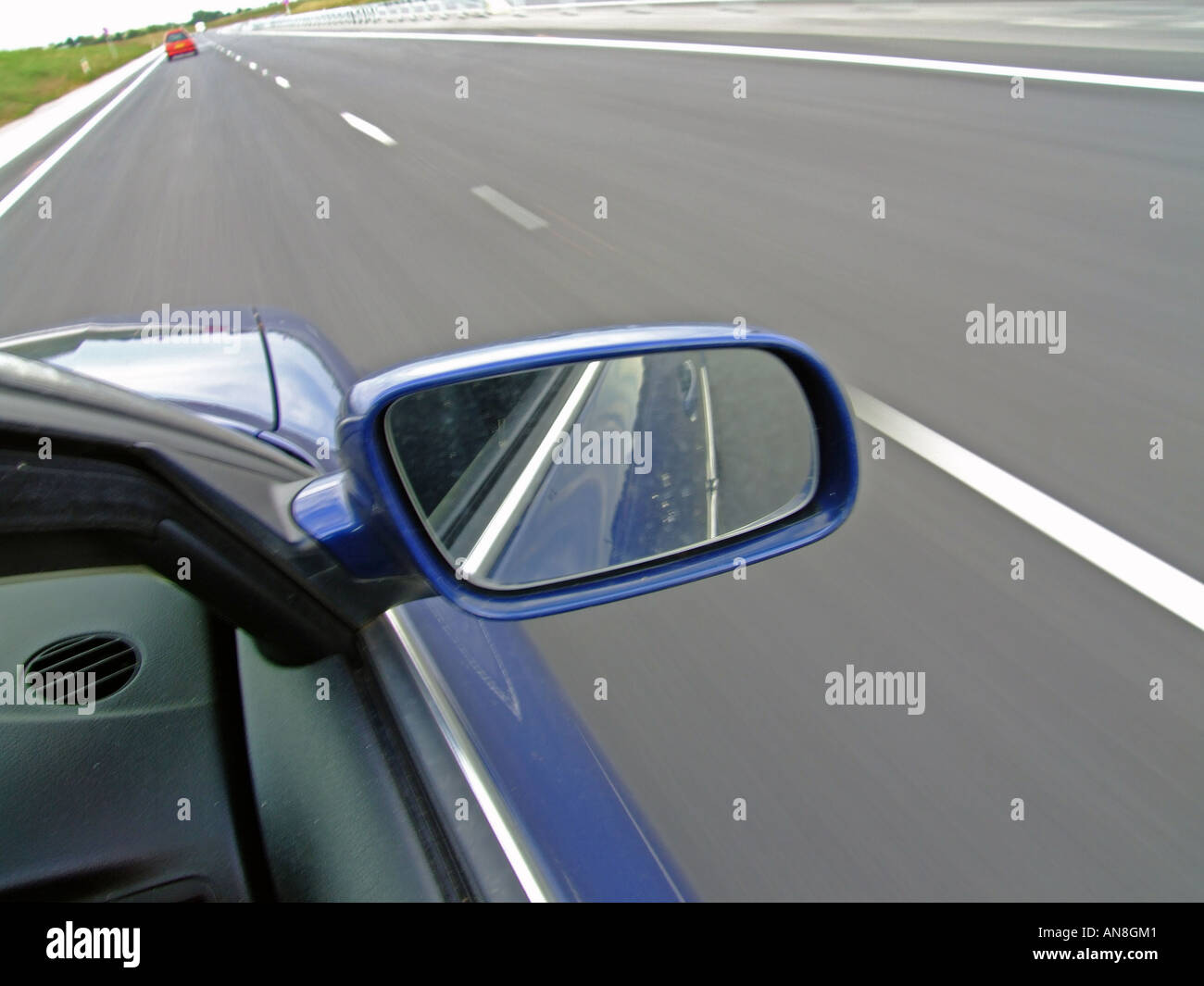 View from the window of a speeding car Stock Photo - Alamy