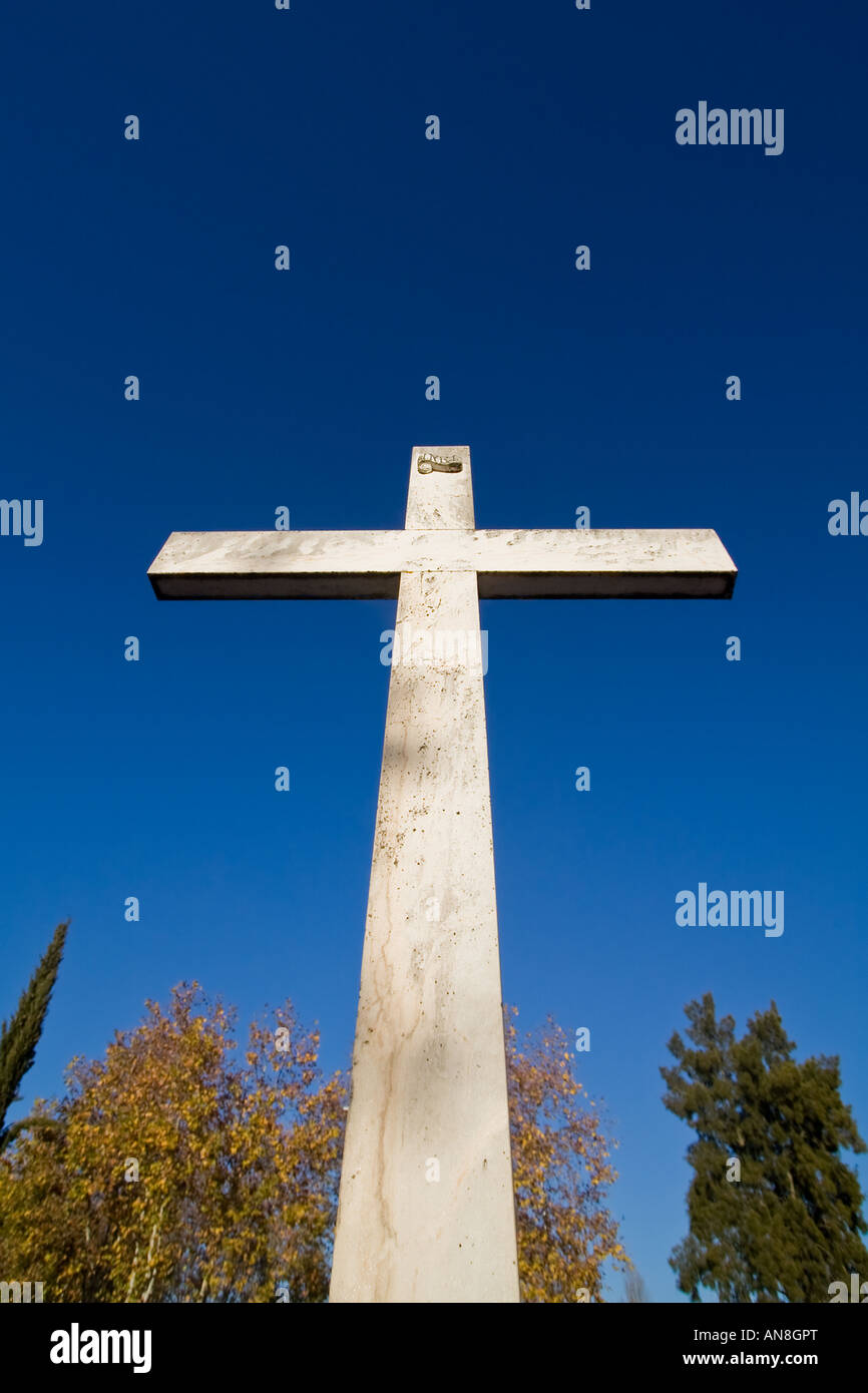 large stone cross against clear blue sky Stock Photo - Alamy
