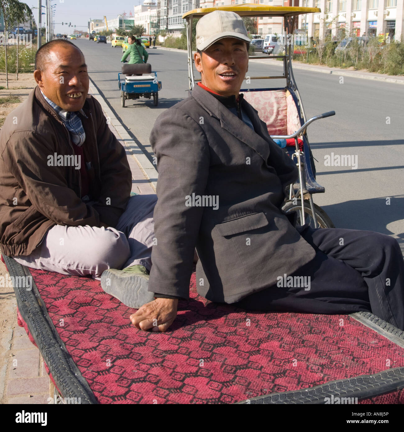 china ereen border town portrait of 2 porters Stock Photo - Alamy