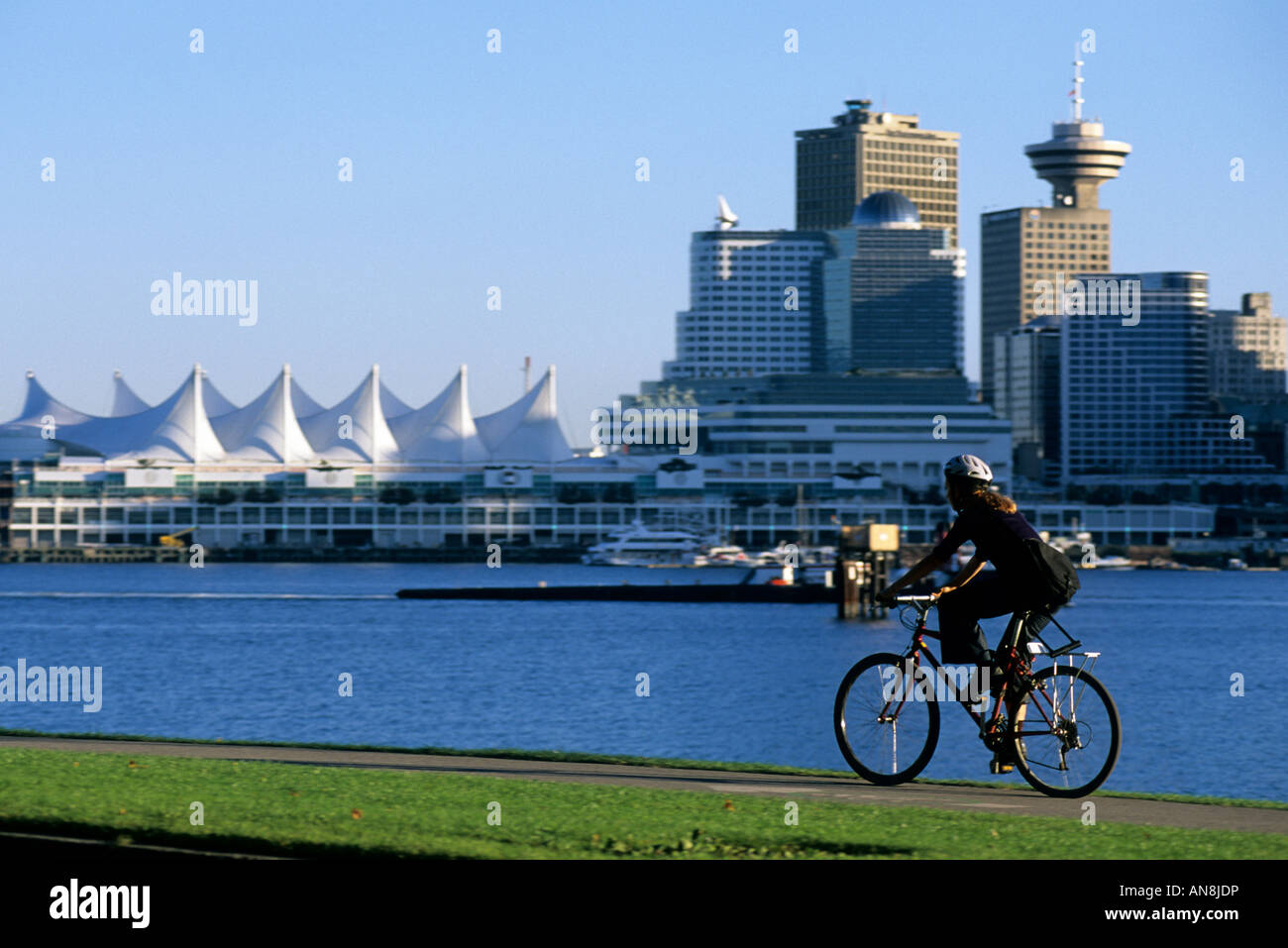 Vancouver skyline cycling in Stanley Park, Vancouver, British Columbia ...