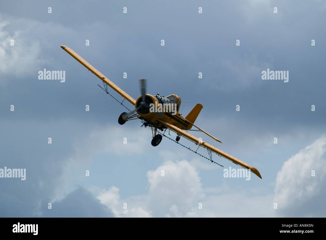 Airplane spraying pesticides Stock Photo - Alamy