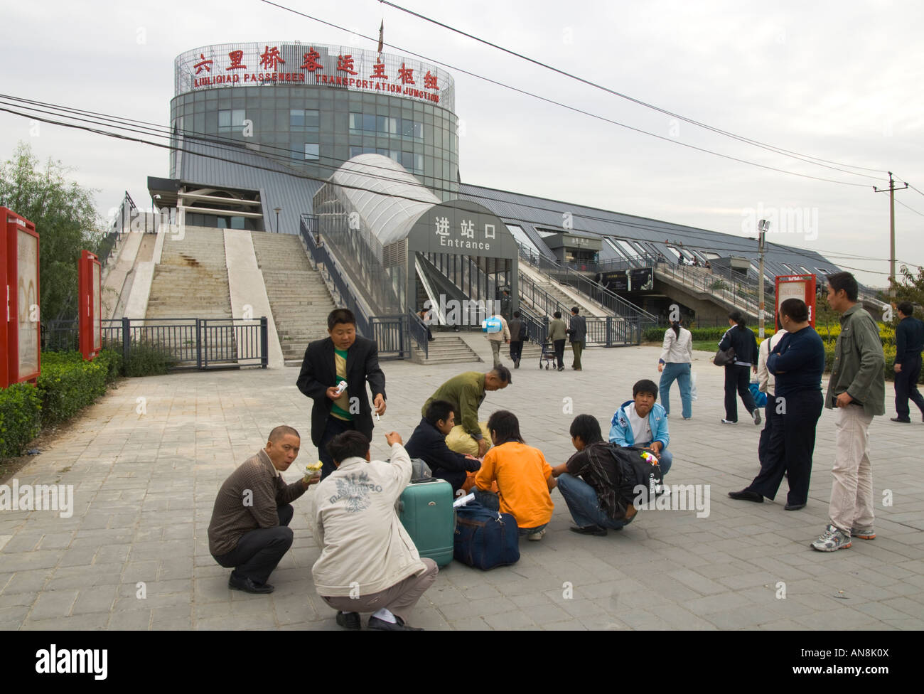 China Beijing long distance bus hub station with people waiting in ...