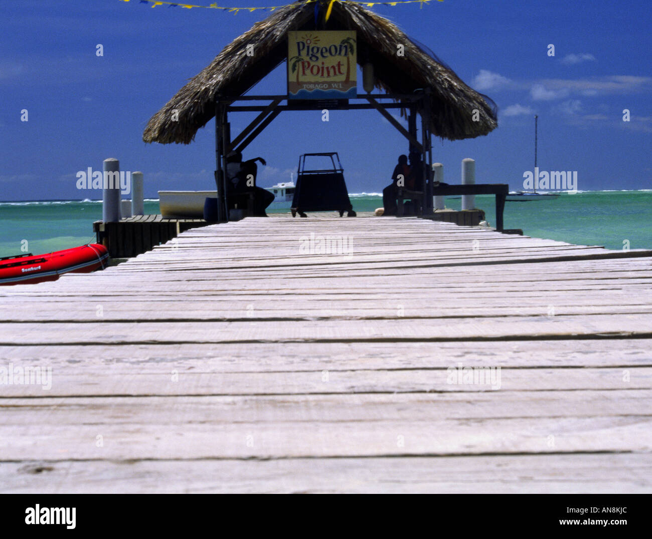 Sunshine at pigeon point beach pier in south Tobago Stock Photo - Alamy