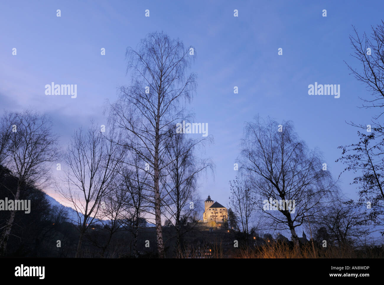 Historic Werdenberg Castle illuminated on a winter evening, Rheintal CH ...