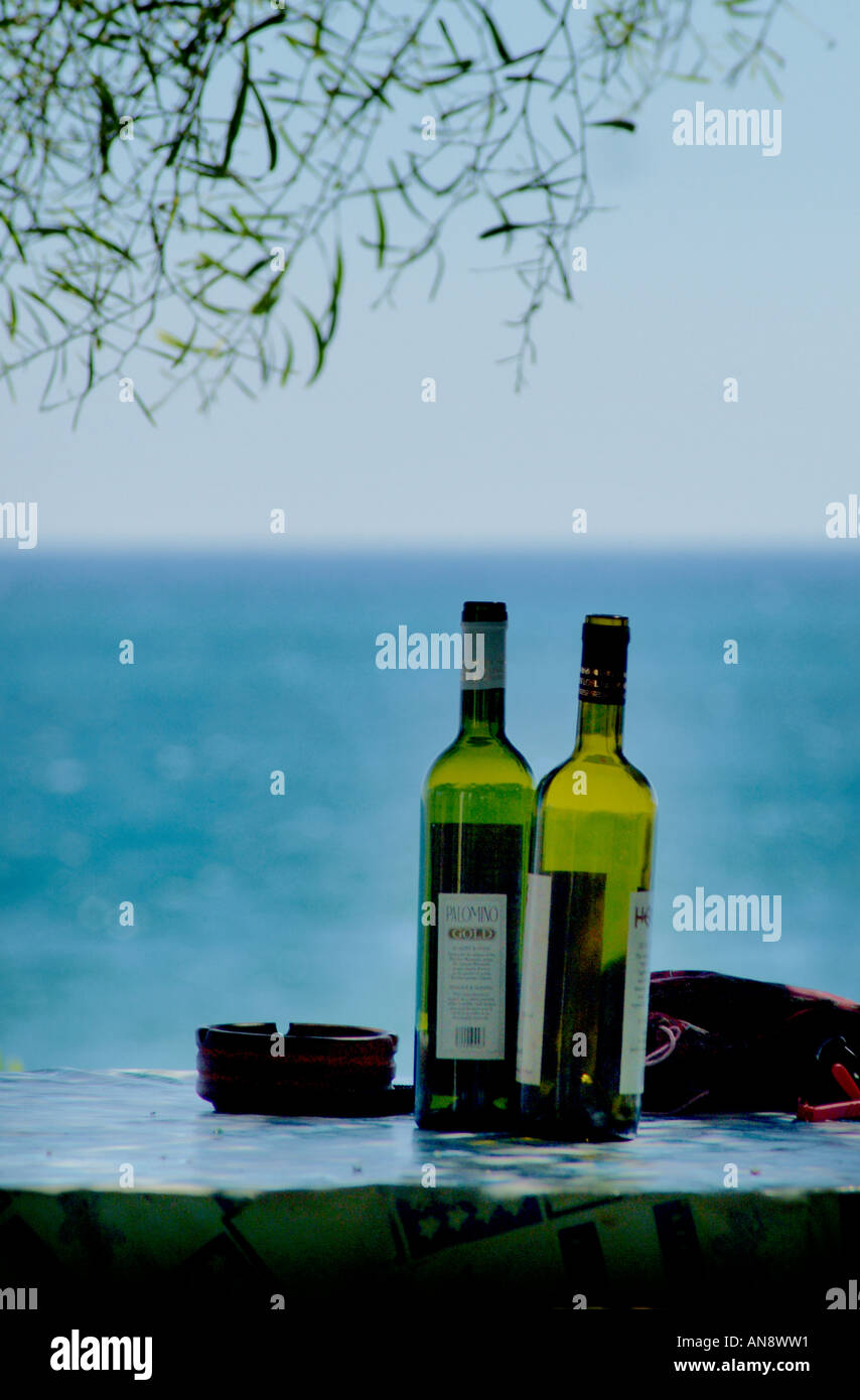 Bottles on table Stock Photo - Alamy