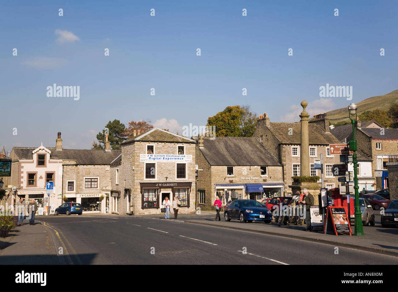 Traditional limestone buildings in historic town centre in "Market ...