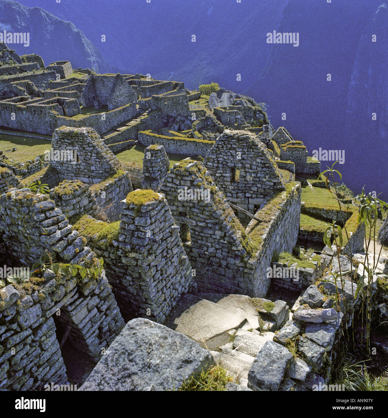 Stone buildings at the Inca citadel of Machu Picchu in the Andes of ...