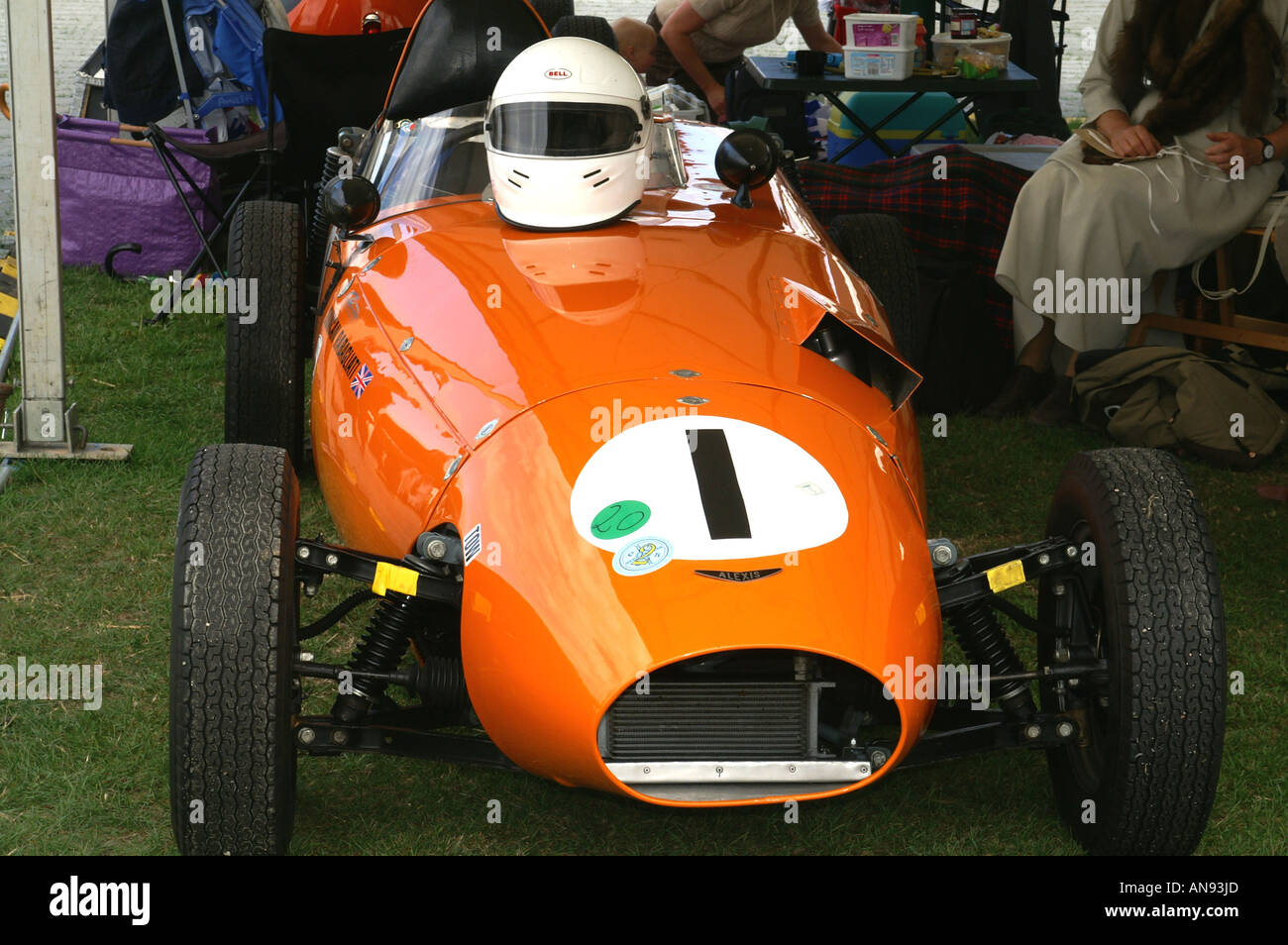 Alexis Racing car and helmet Stock Photo - Alamy