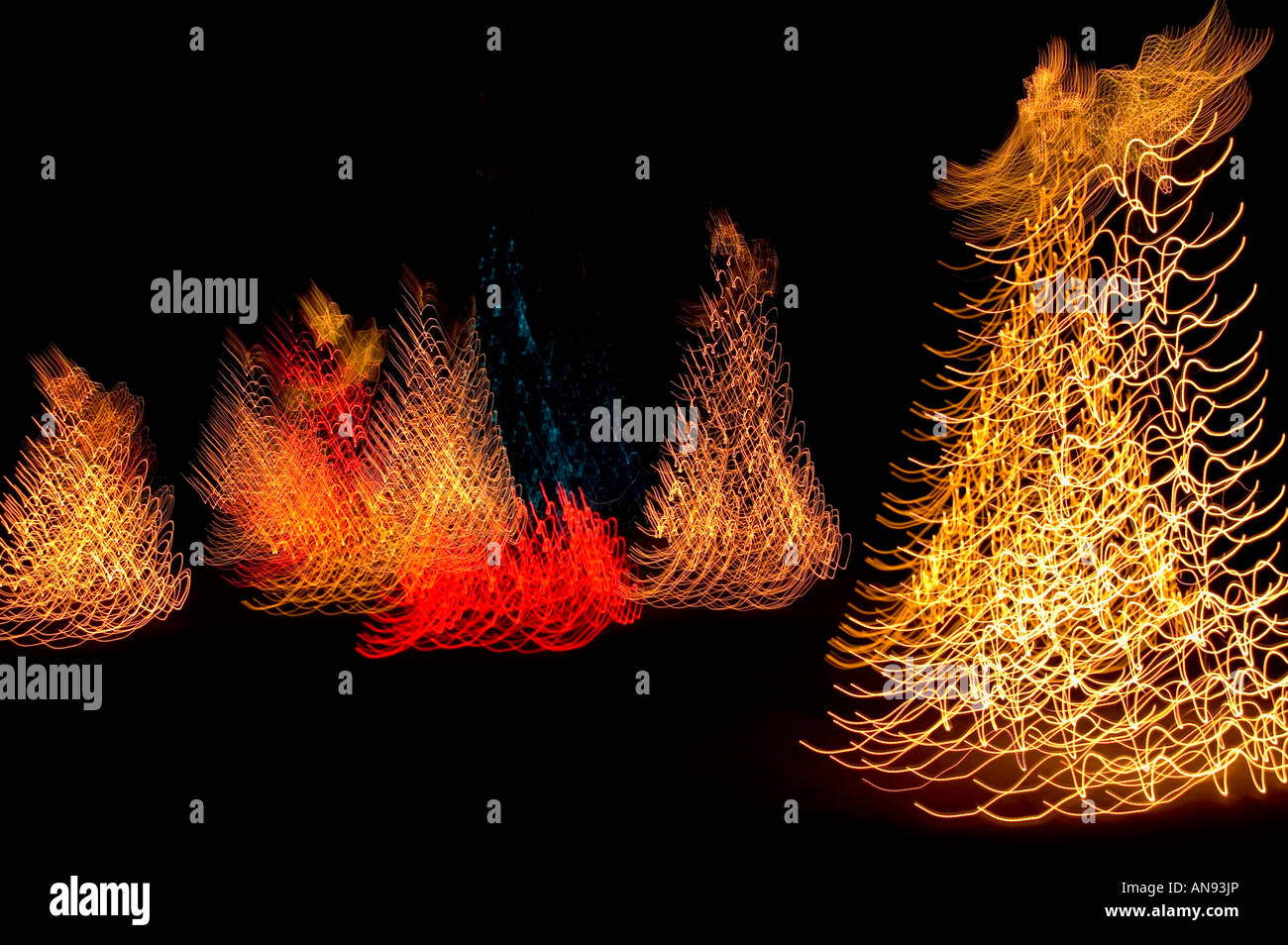 Lighted Christmas tree forest Stock Photo - Alamy