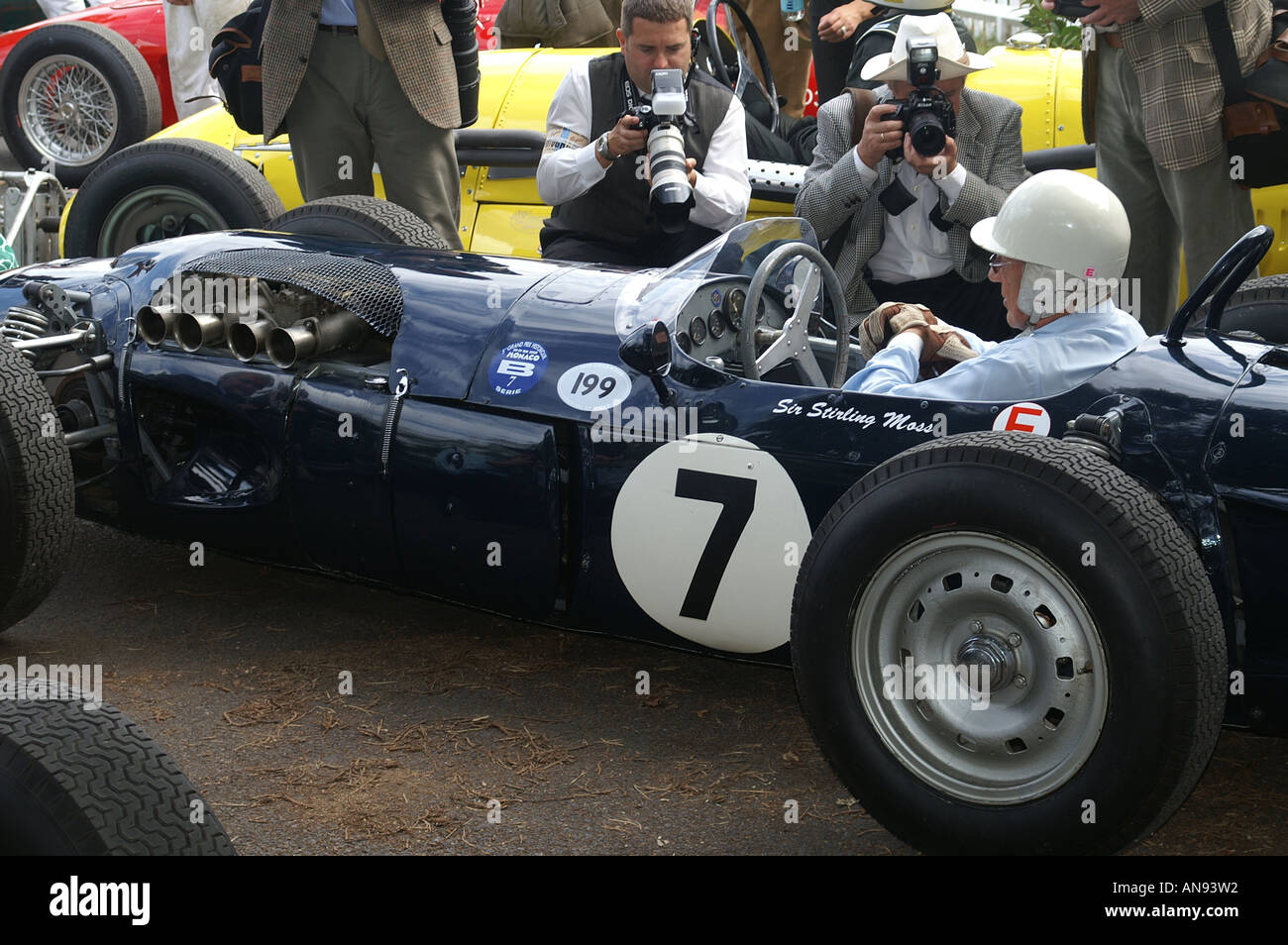 Sir Stirling Moss in racing car at Goodwood Stock Photo - Alamy