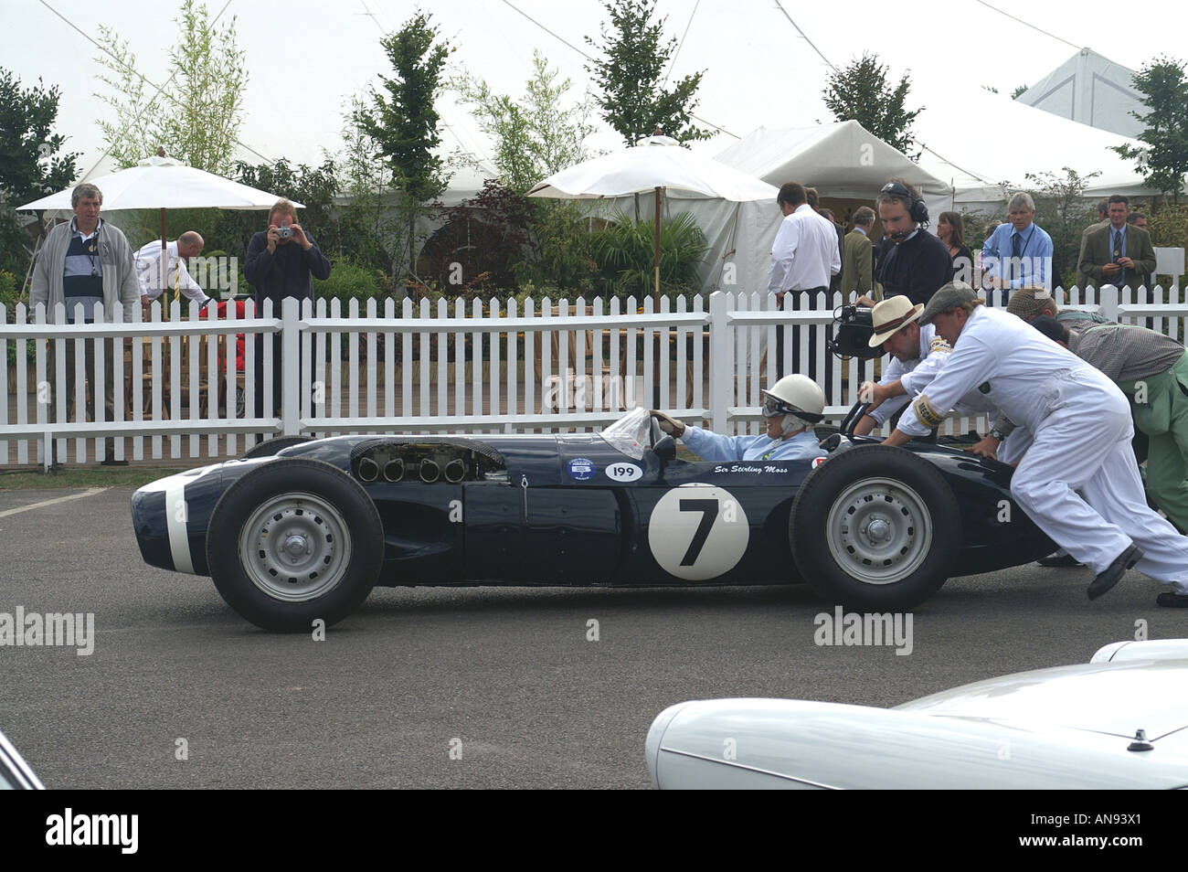 Sir Stirling Moss in racing car at Goodwood Stock Photo - Alamy