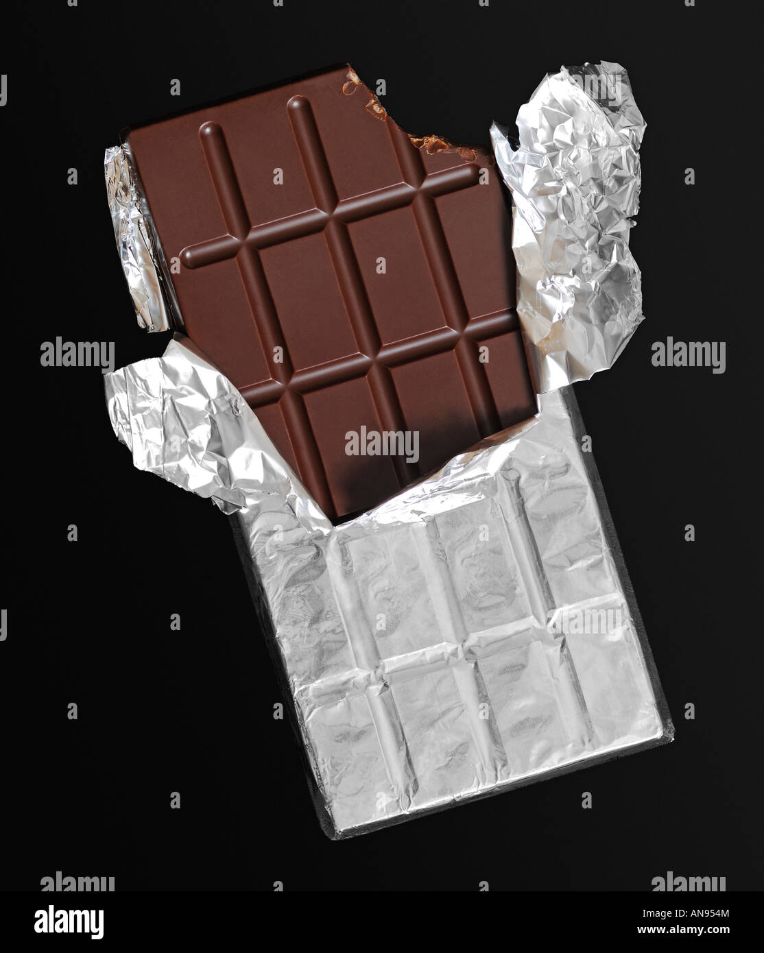 Chocolate Candy Bar with the Corner Bitten Off Stock Photo - Alamy