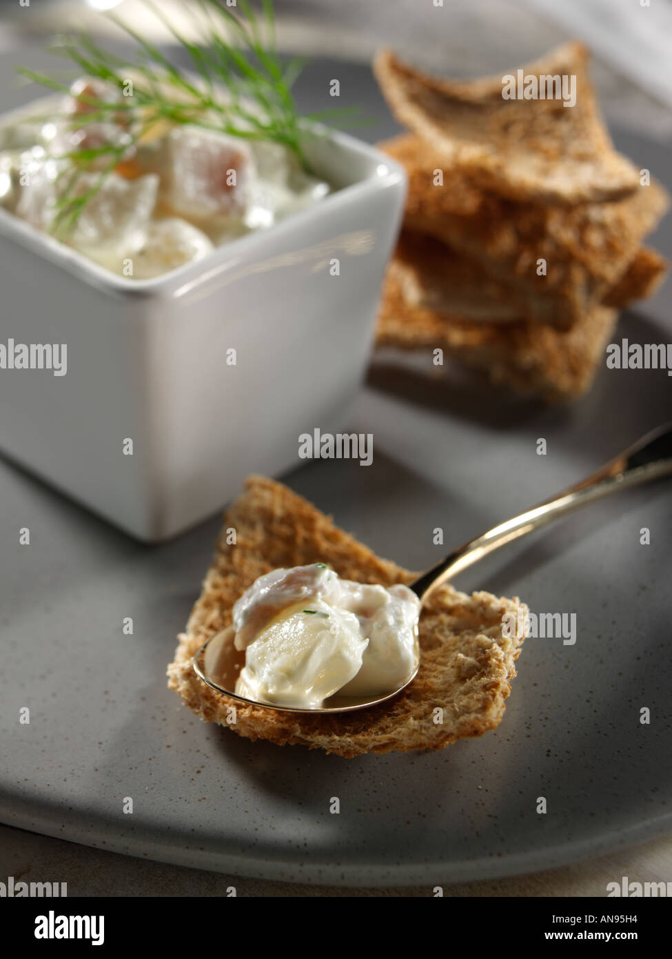 Marinated Halibut with organic toast Stock Photo - Alamy