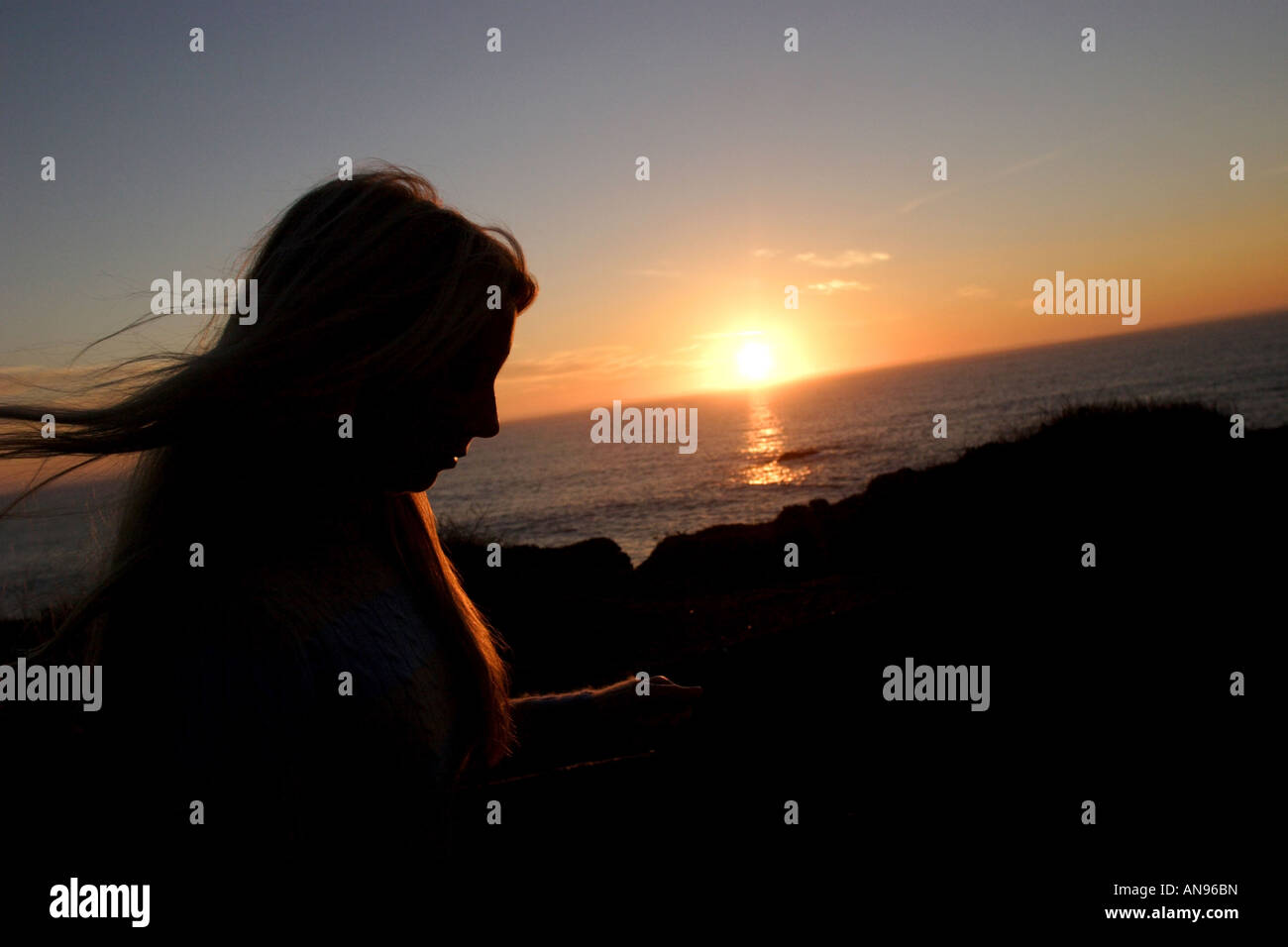 Girl watching the waves hi-res stock photography and images - Alamy