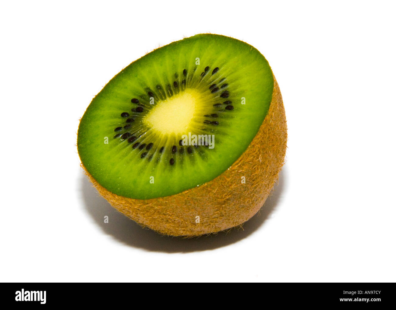 Single kiwi cut in half Cut Out Stock Images & Pictures - Alamy