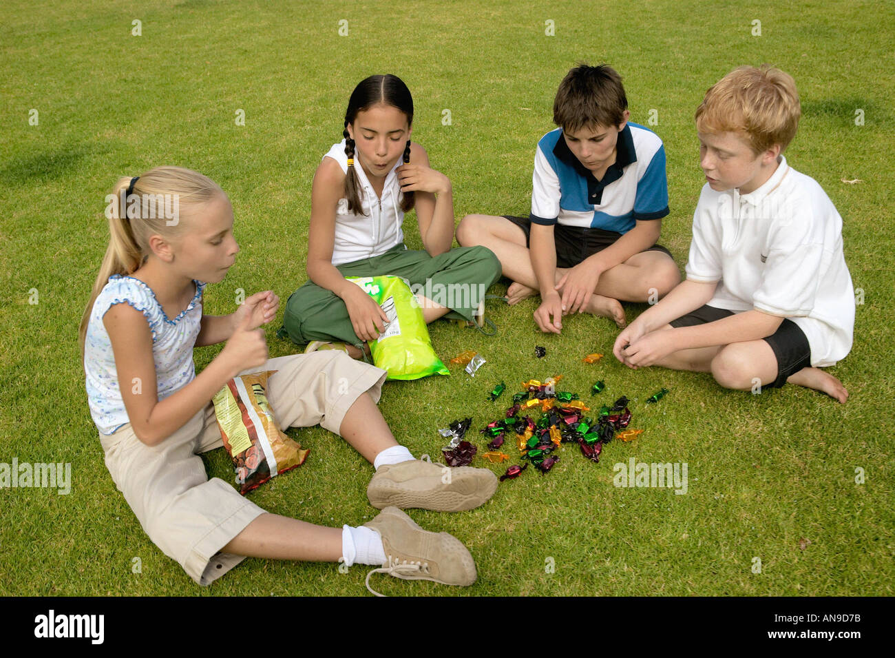 Children eating sweets Stock Photo - Alamy Children eating sweets Stock Photo - Alamy