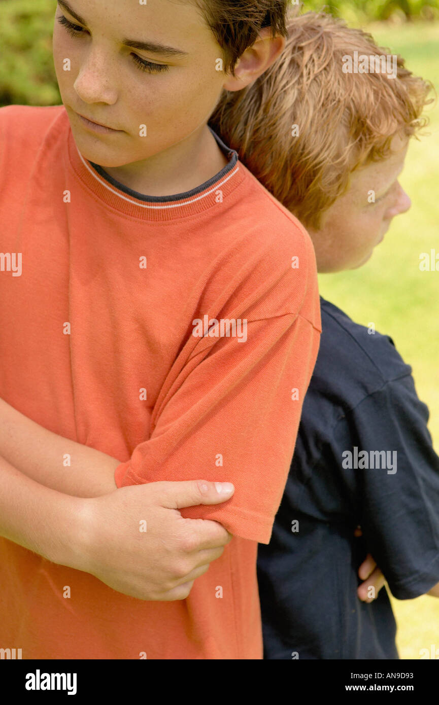Boys not talking to eachother Stock Photo - Alamy