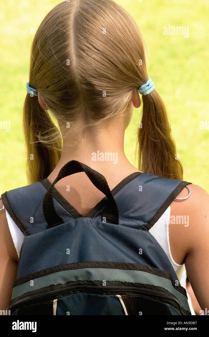 Girl with rucksack on her back Stock Photo - Alamy