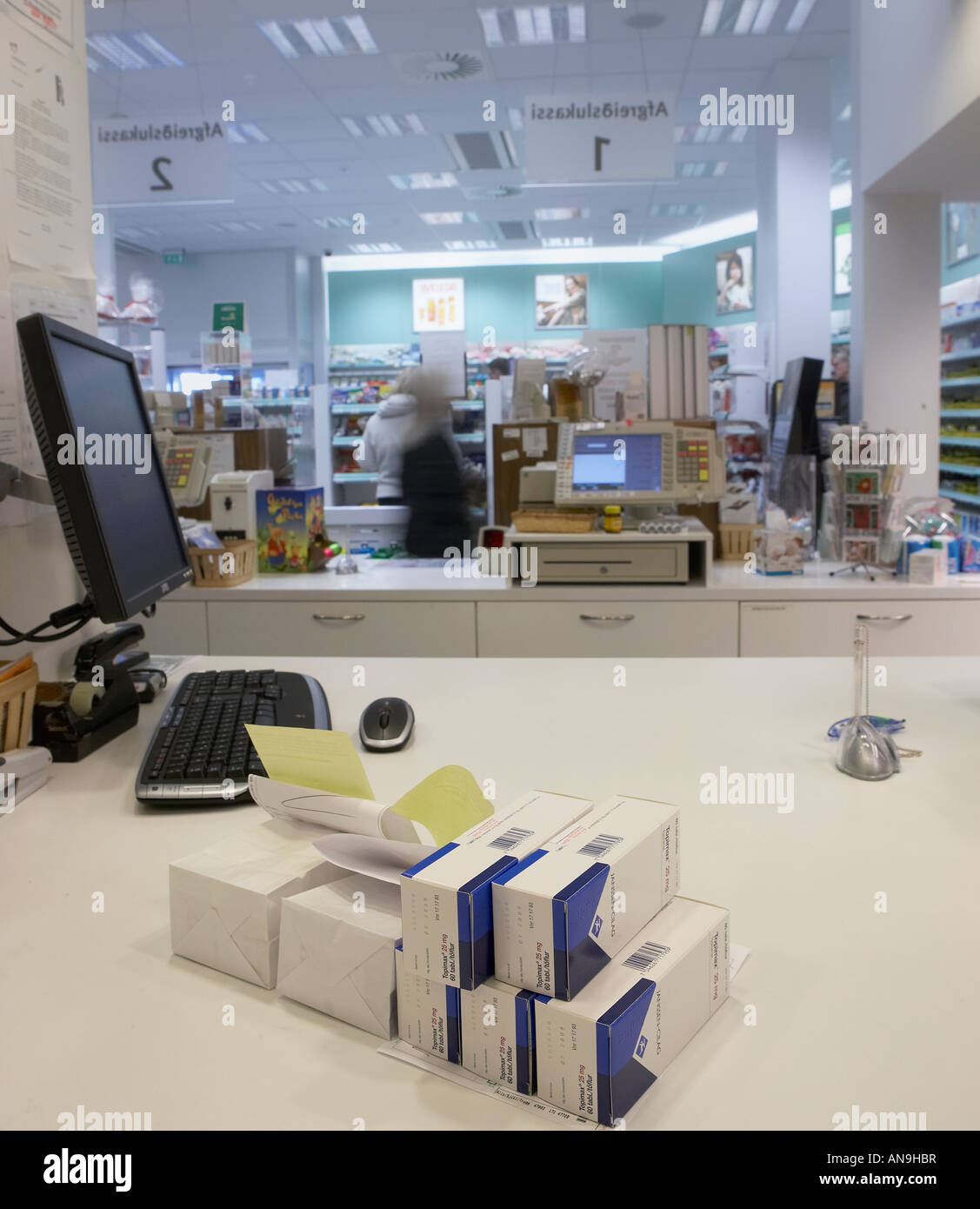 Pharmacy with medications and computer Stock Photo - Alamy