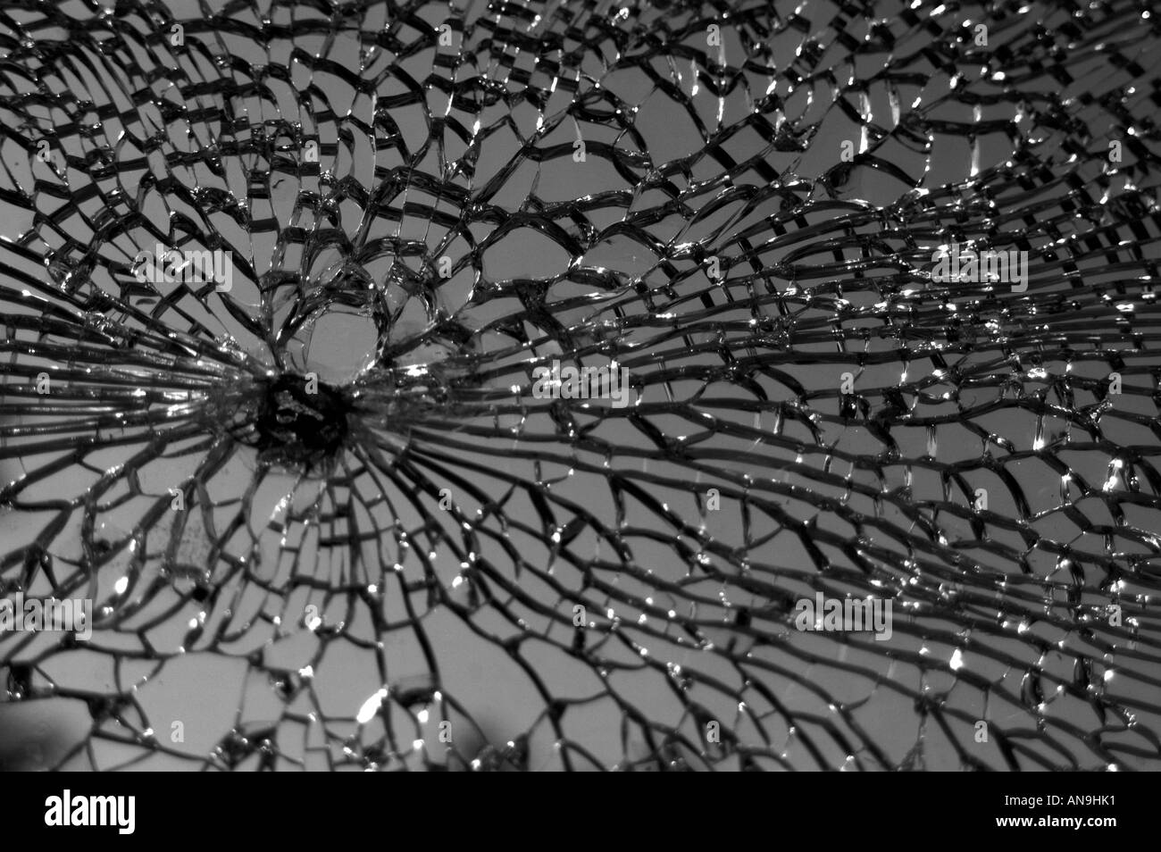 BROKEN GLASS WITH BULLET HOLES Stock Photo - Alamy