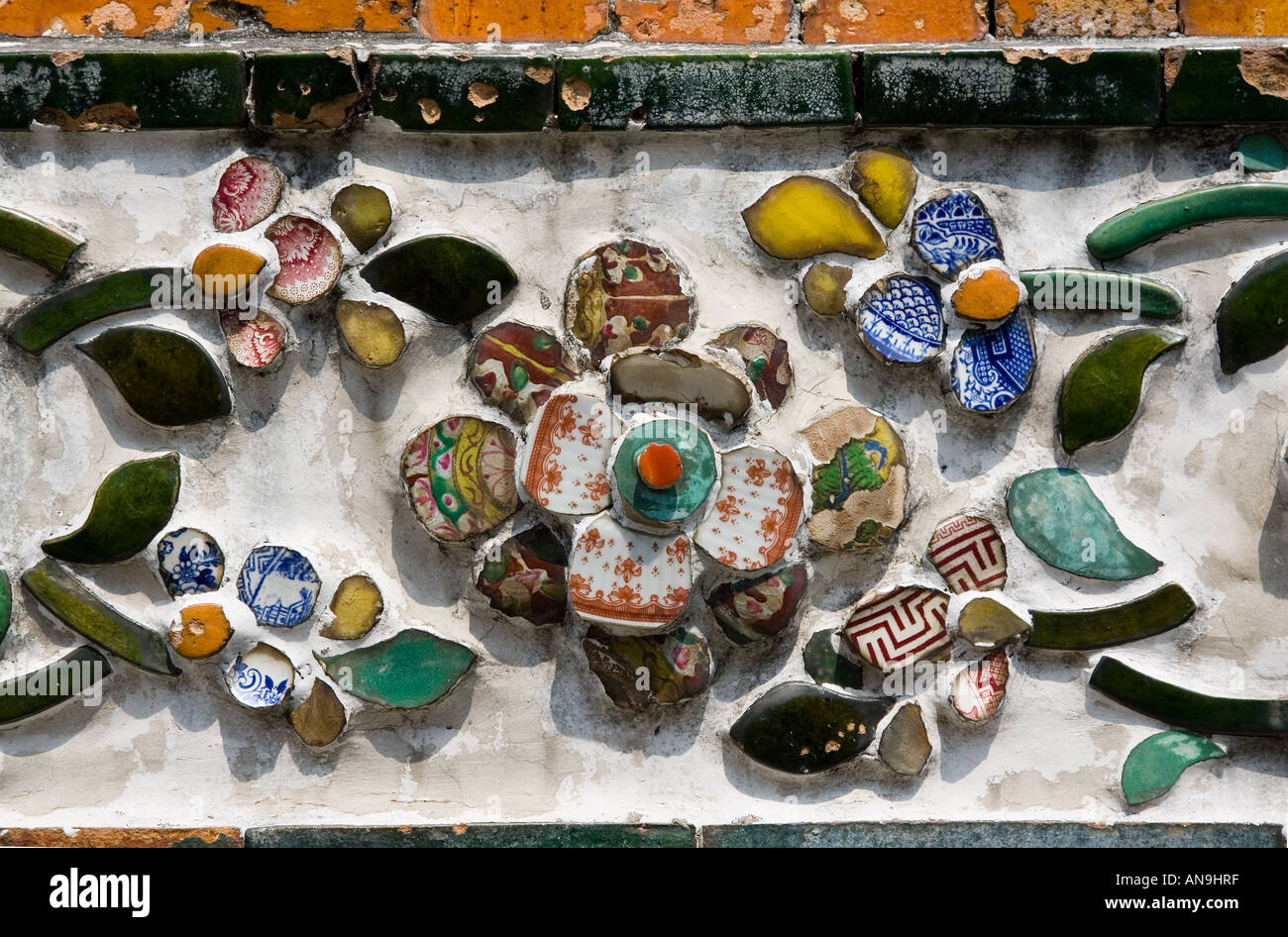 Ceramic tiles decorating the walls of Wat Arun Temple of the Dawn ...