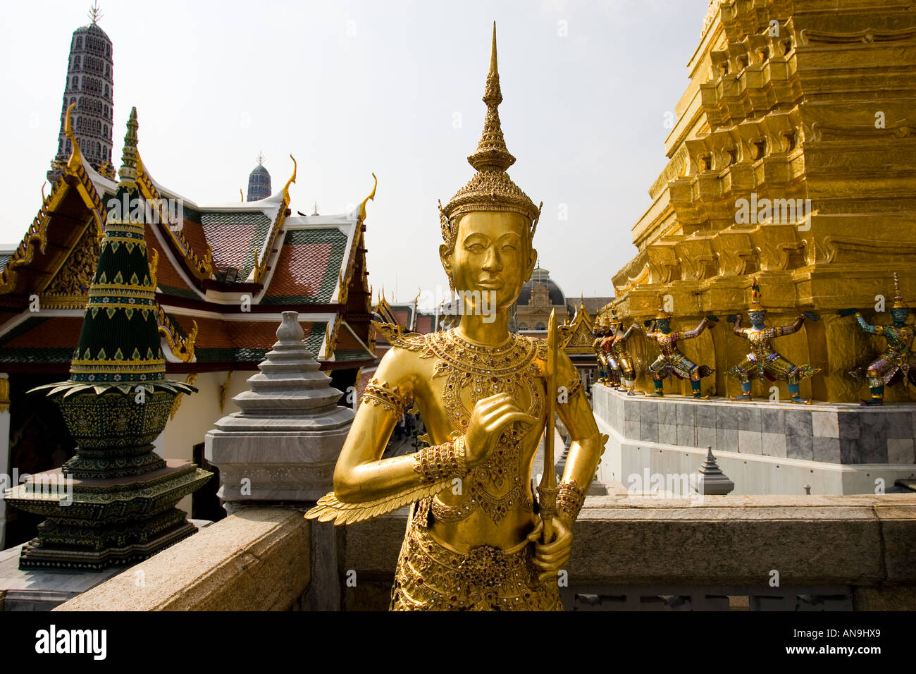 Gilt statue inside The Grand Palace and Temple complex Bangkok Thailand ...