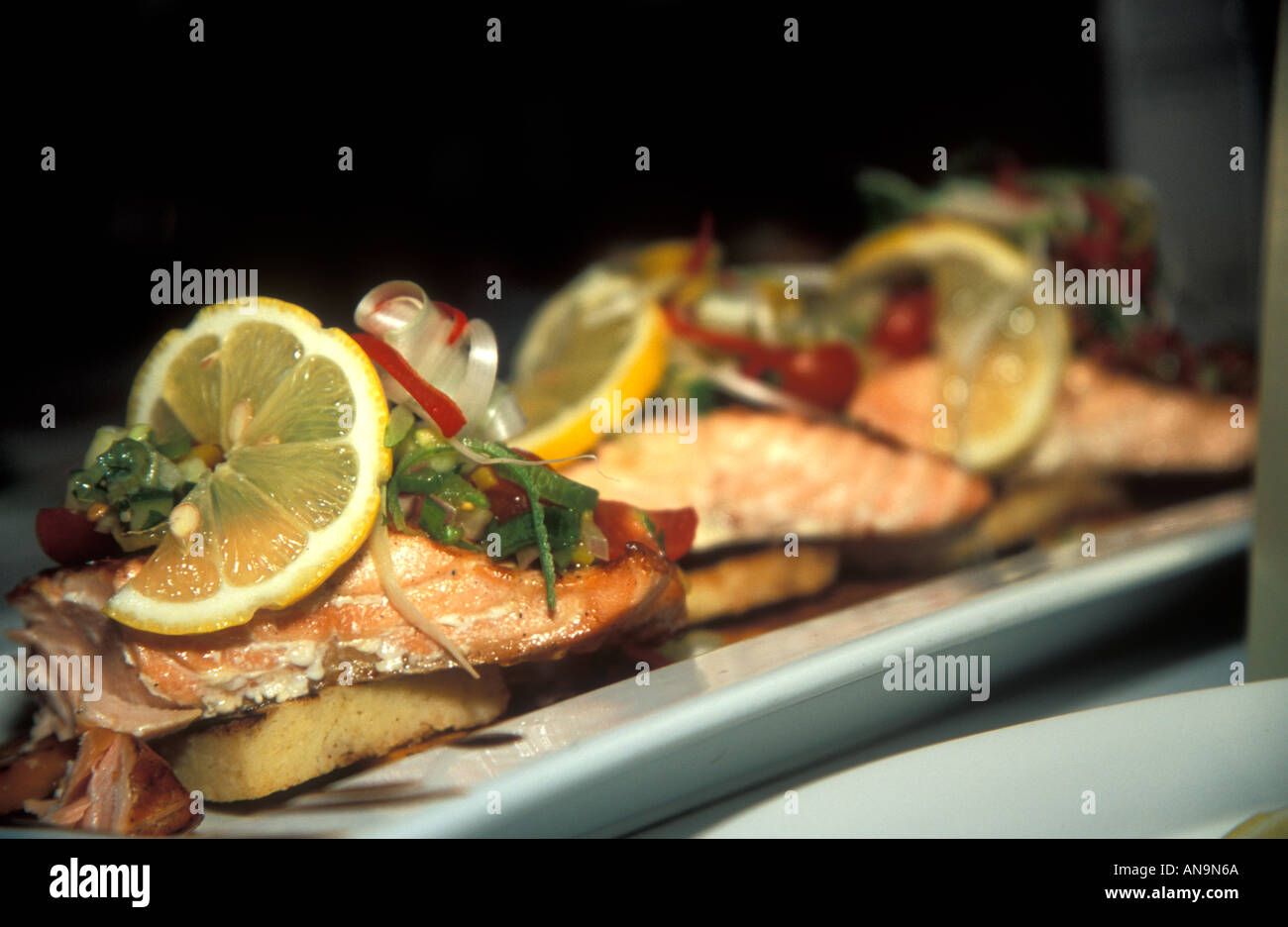Salmon dish on display at a food fair Stock Photo - Alamy