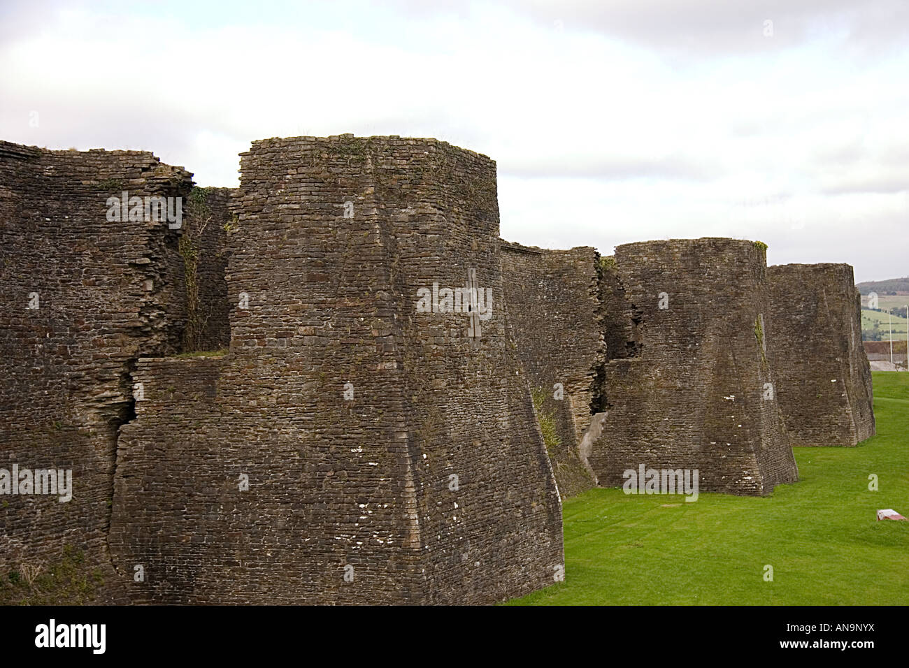 Caerphilly Castle external east wall buttresses Stock Photo - Alamy