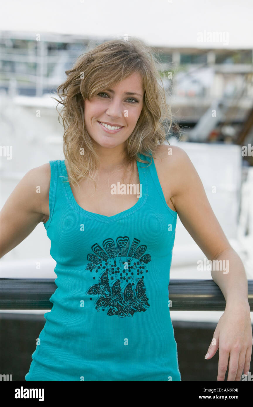 Young woman wearing tank top Stock Photo - Alamy