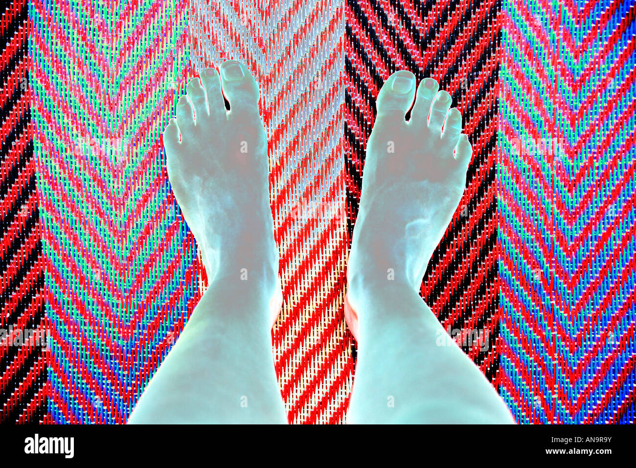 Pair of shins and feet Stock Photo - Alamy