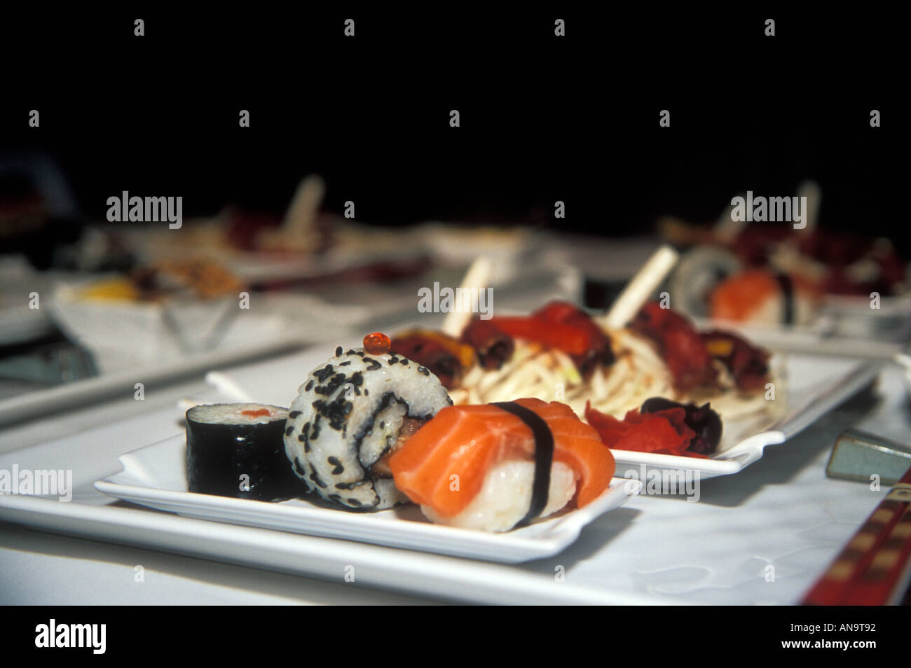 Sushi on display at a food fair Stock Photo - Alamy