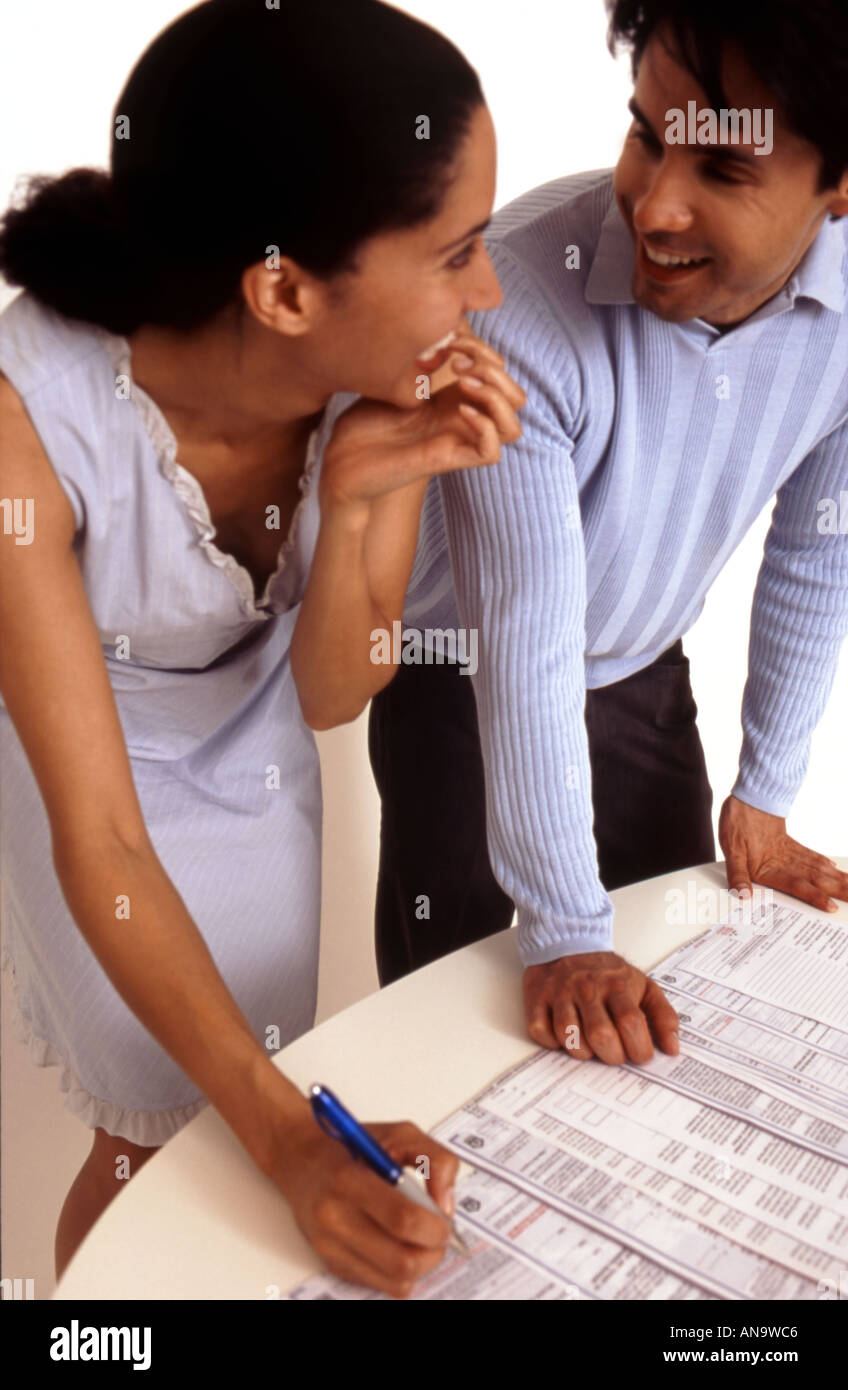 Man woman fill up documents hi-res stock photography and images - Alamy