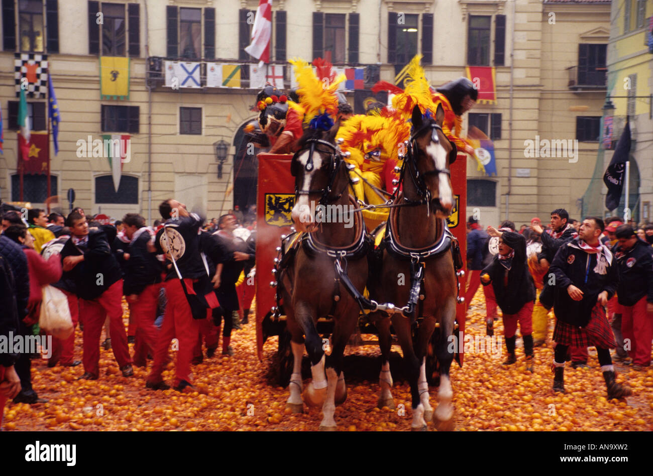 Orange battle at the carnival of Ivrea, Italy Stock Photo - Alamy