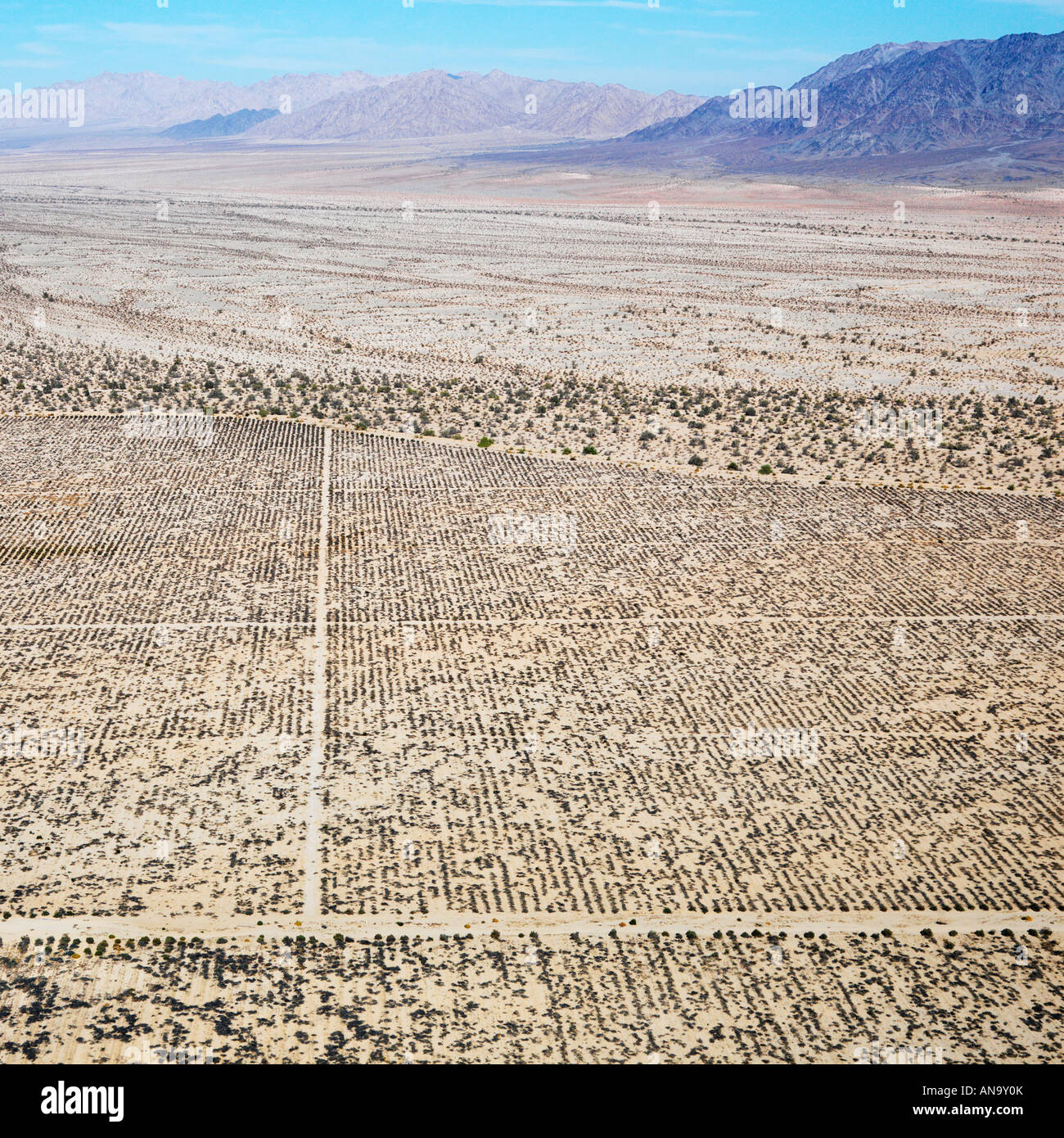 Aerial view of remote California desert with grid pattern and mountain ...