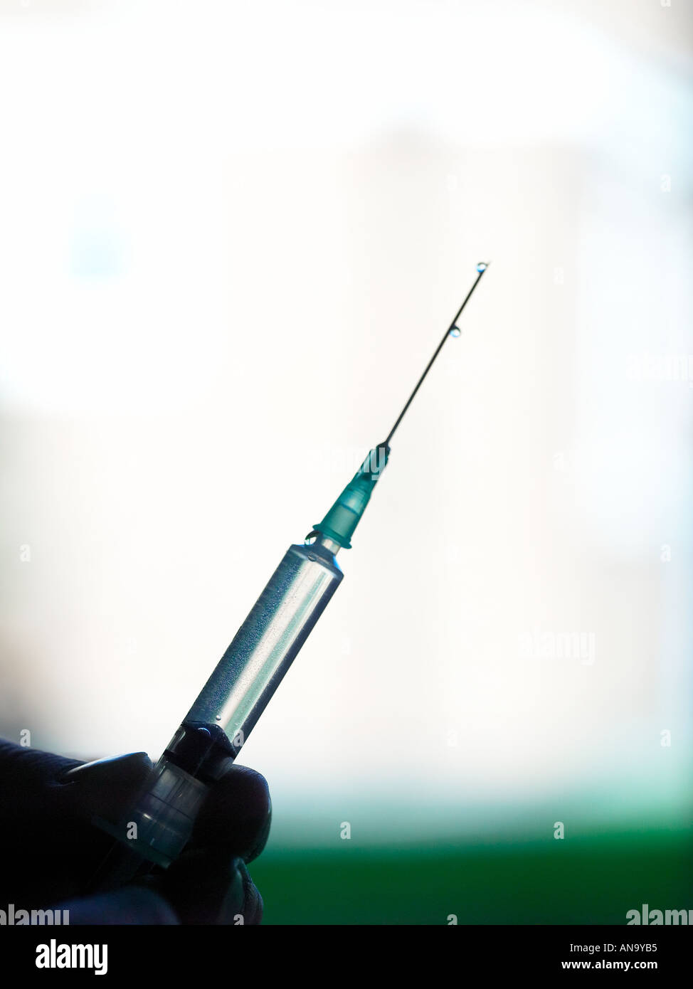 syringe ready for injecting Stock Photo - Alamy