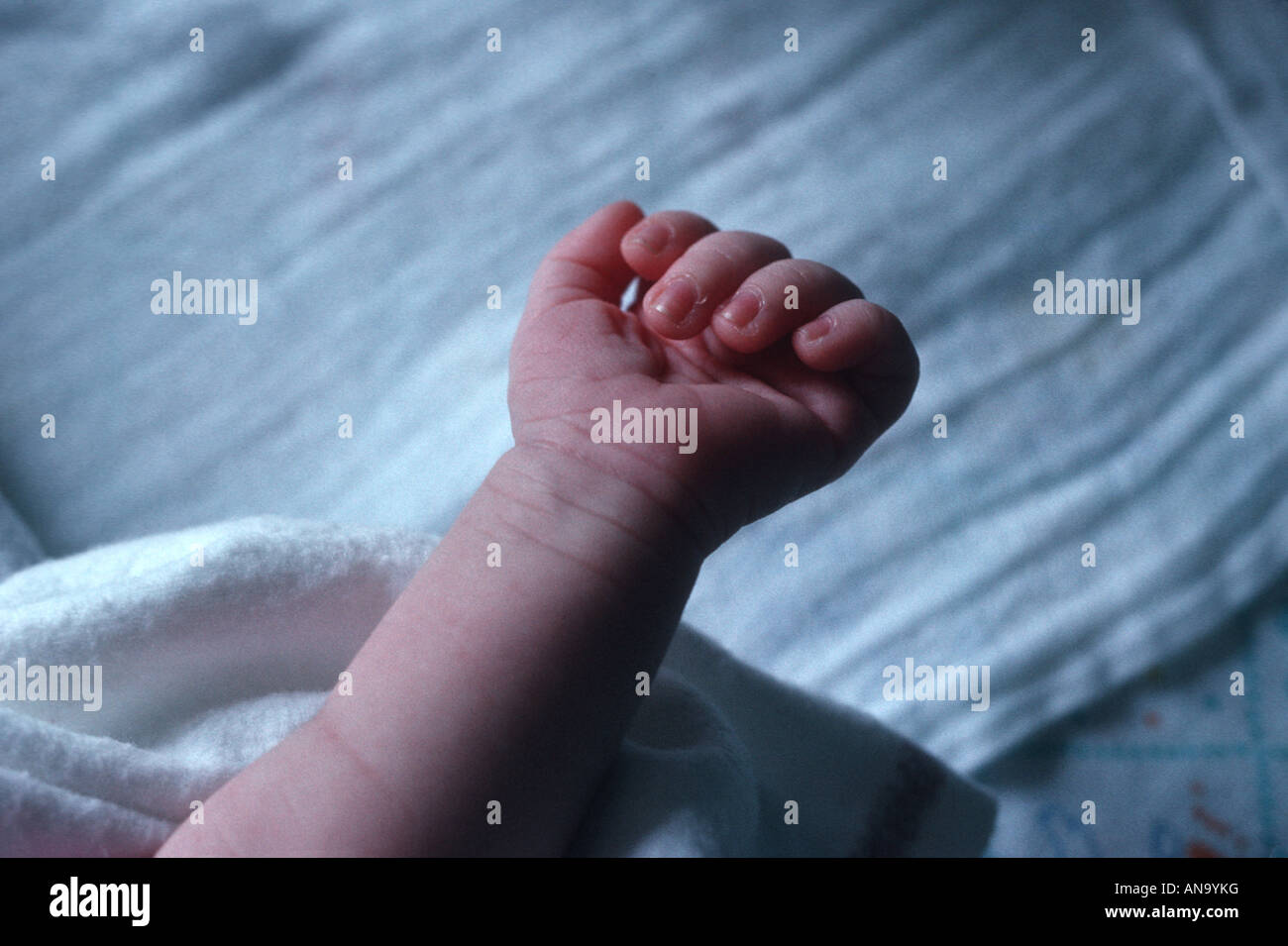 Hand of a sleeping infant girl Stock Photo - Alamy