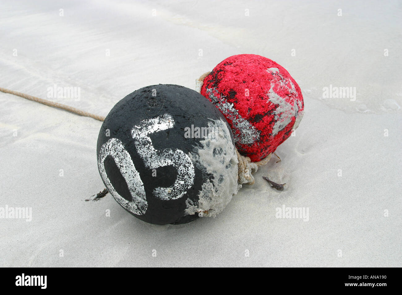 Bouy on a beach Stock Photo - Alamy