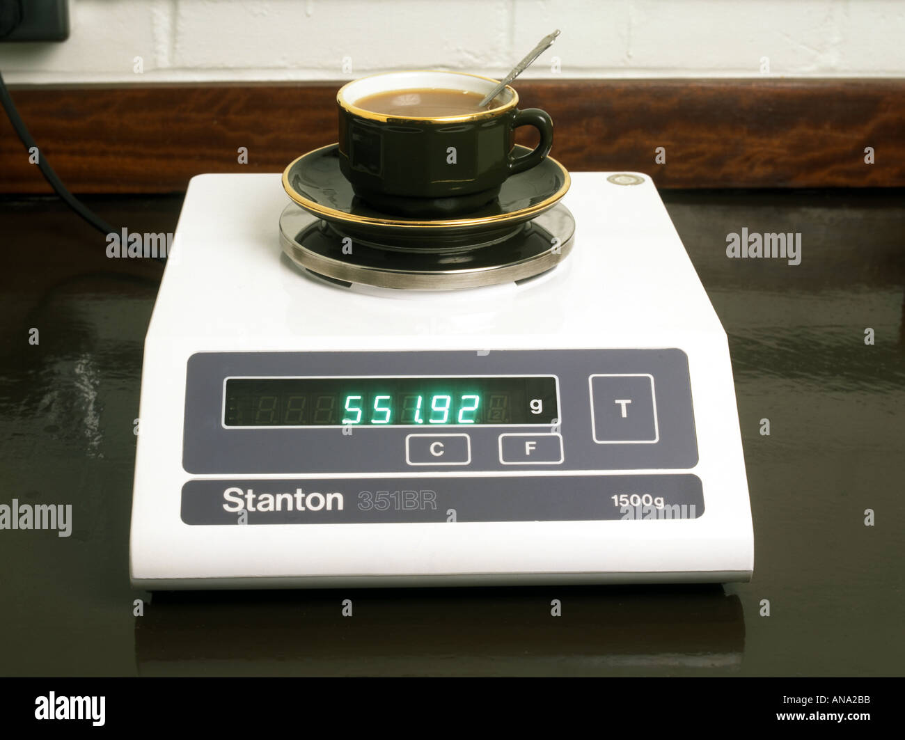 showing conservation of mass weighing the cup of coffee with sugar and ...