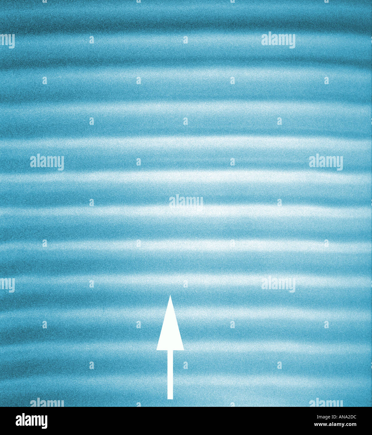 straight waves in a ripple tank with arrow to indicate direction of ...