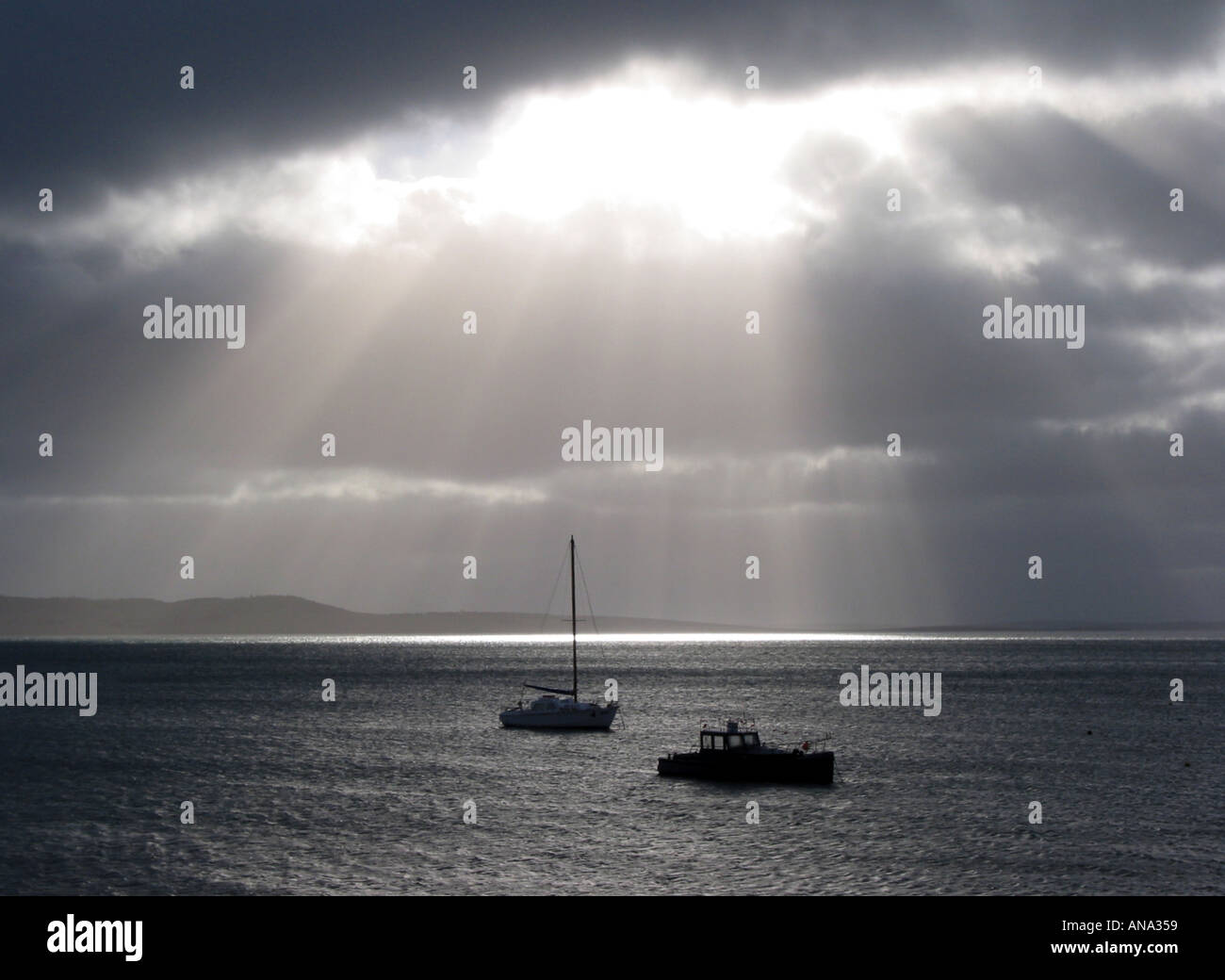 Sunray over boats Stock Photo - Alamy