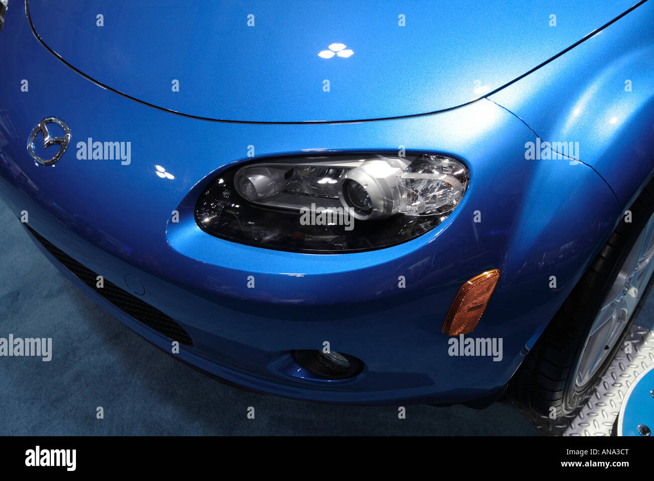 Mazda Miata blue metallic car headlight close-up; Toronto International ...