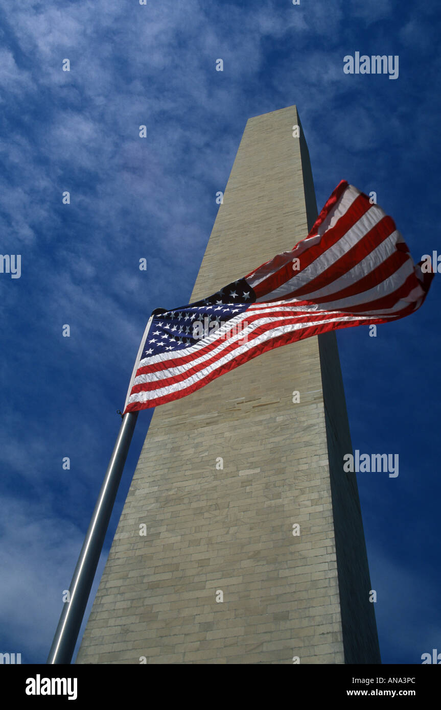 American flag waving in front of the Washington Monument Washington DC ...