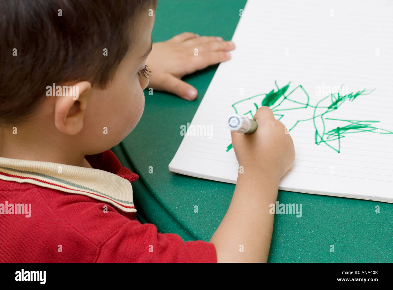 young boy drawing Stock Photo - Alamy