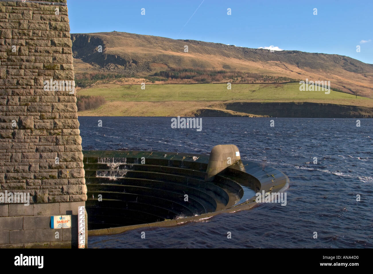 Overflow bellmouth in Dovestone reservoir with water at high level and ...