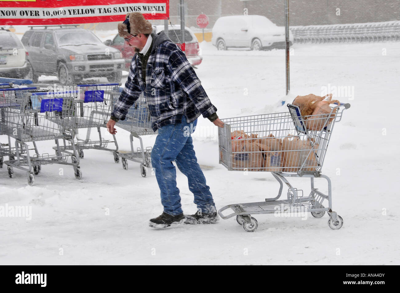 Grocery shopping during a winter snow storm during the Winter season in ...