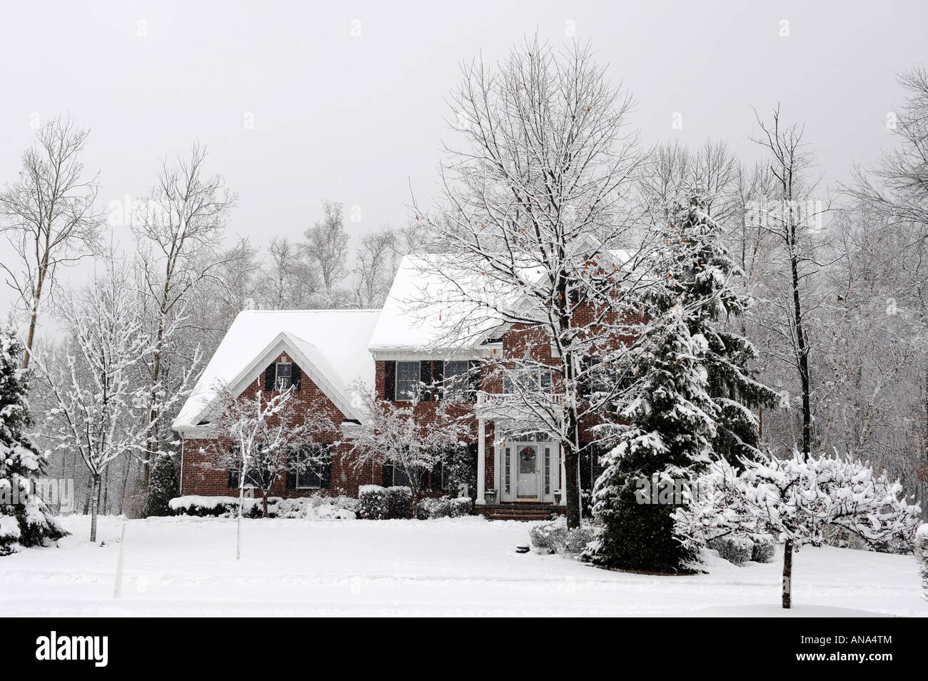 Residential home after winter snowfall Stock Photo - Alamy