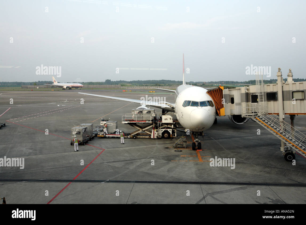 View from a window of Tokyo Naritah Airport terminal with a jumbo ...