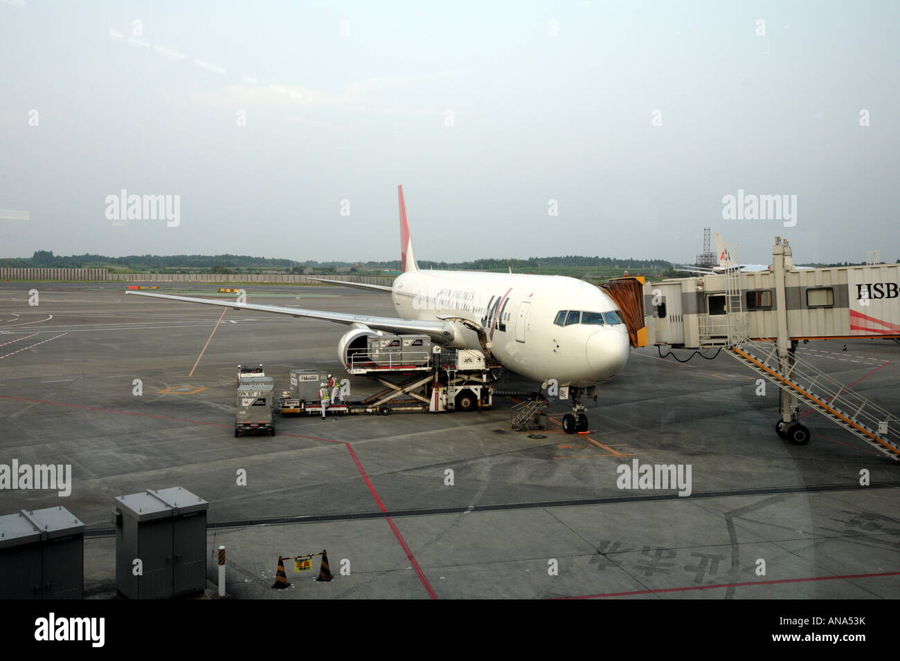 View from a window of Tokyo Naritah Airport terminal with a jumbo ...