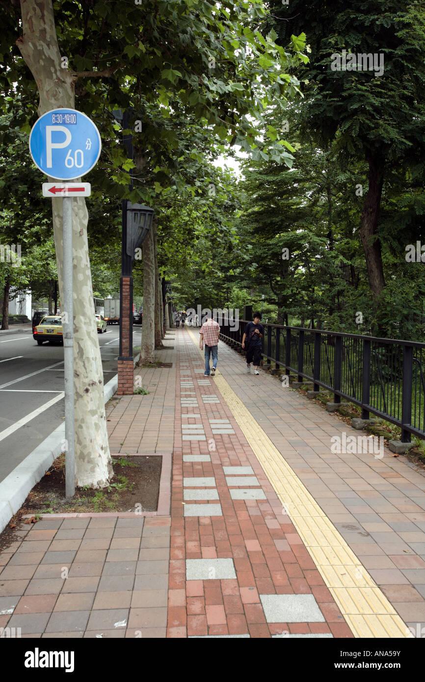 Sidewalk and parking sign in Sapporo Japan Stock Photo - Alamy